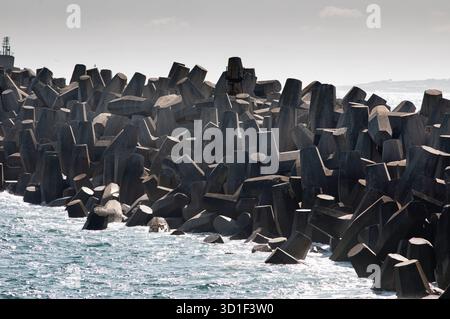 Artificial dike constructed with concrete pillars in the port of Moras ...
