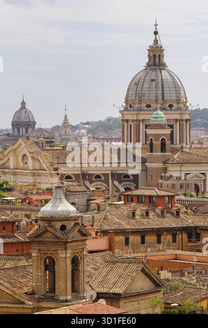 Panoramic view to Rome rooftops with catholic basilics and monuments ...