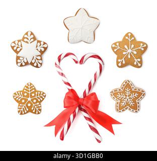 Collage of sweet candy canes with cookies and Christmas decorations on ...
