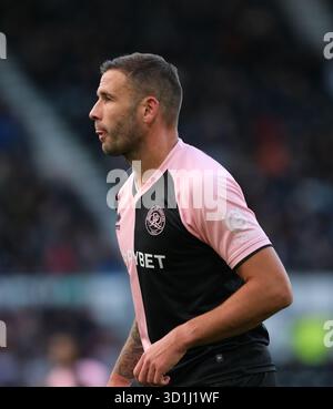 Steve Cook of Queens Park Rangers tackles Jarrod Bowen of West Ham ...