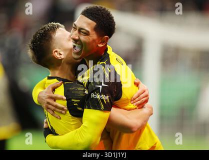 Final celebration from left: Nico Schlotterbeck, goalkeeper Gregor ...
