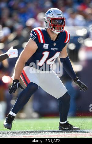 New England Patriots linebacker Robert Spillane (14) walks the sideline before an NFL football ...