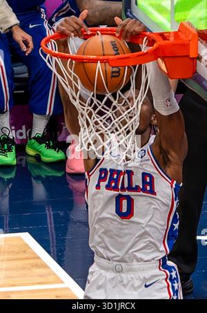Philadelphia 76ers guard Tyrese Maxey, left, drives to the basket ...