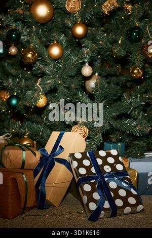 Blue Christmas gift box placed on a yellow art paper floor and have ...
