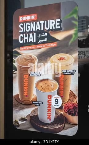 Sign at the entrance to a Dunkin Donuts store in Manhattan. (Photo by ...