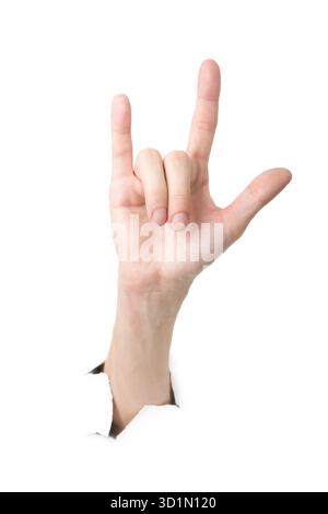 Rock hand gesture through cracked paper Stock Photo - Alamy