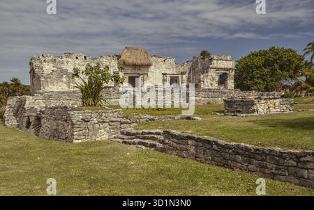 Side view of the remains of a small Mayan temple in the Tulum complex ...