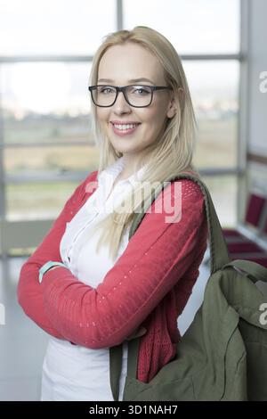 Young beautiful woman on a university lecture working on a laptop Stock ...
