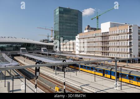 UTRECHT - Waiting travelers at Utrecht Central Station during the ...