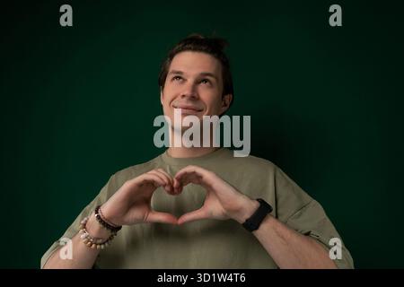 Man making heart symbol with hands Stock Photo - Alamy