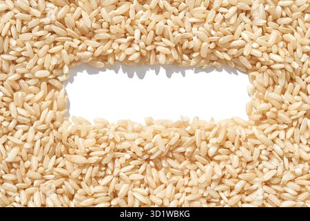 A rectangle frame captures a heap of brown basmati rice on a white ...