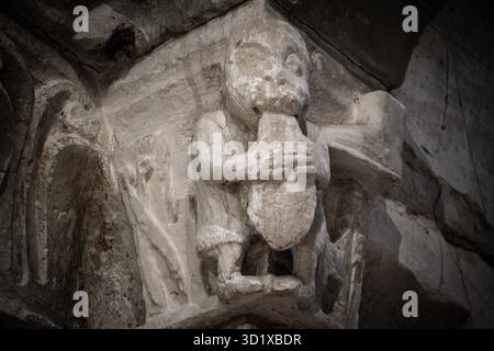 Capital of an ogre eating Stock Photo - Alamy