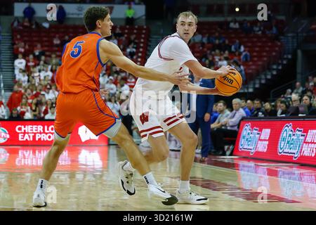 Wisconsin guard Andrew Rohde looks on during the second half of an NCAA ...