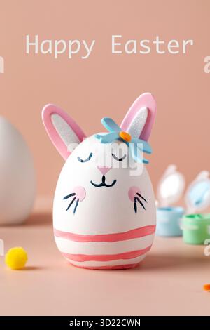Happy easter. The inscription on the greeting Easter card with eggs ...