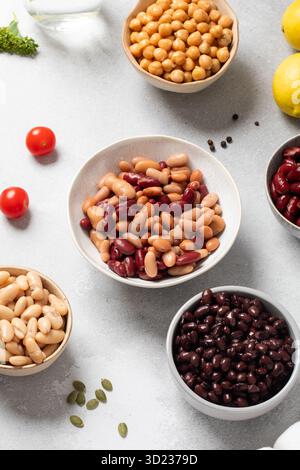 Different types of canned beans in bowls for healthy eating concepts ...