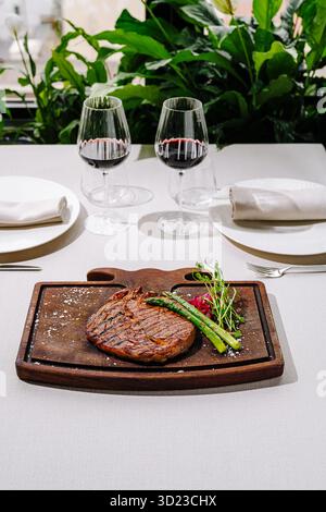 A cozy dining setting featuring a wooden table with four chairs ...