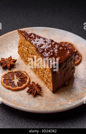 A piece of chocolate cake covered by nuts, close-up Stock Photo - Alamy
