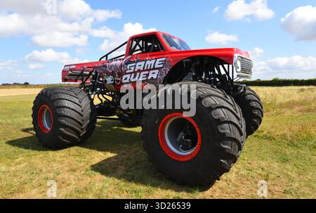 Game Over Monster Truck close up parked on grass Stock Photo - Alamy