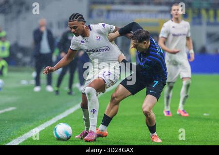 Cher Ndour of ACF Fiorentina competes for the ball with Jens Odgaard of ...