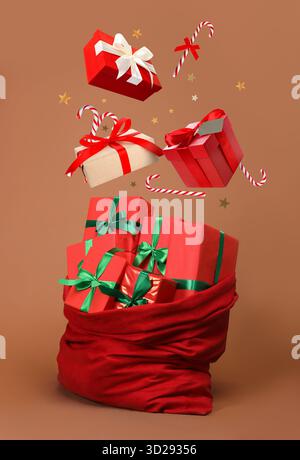 Christmas gift boxes with candy canes on light background Stock Photo ...