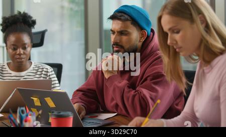 concentrated business team at the workplace thinking about business ...