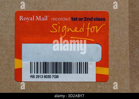 Close up of a Royal Mail recorded delivery label on a parcel showing ...