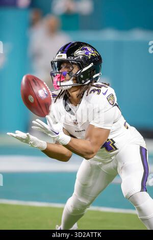 Baltimore Ravens running back Keaton Mitchell runs the ball for a ...