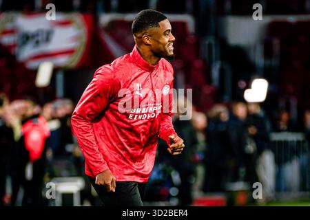 Myron Boadu of PSV Eindhoven looks on and holding championship trophy ...