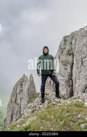 Man standing on the mountain ridge Stock Photo - Alamy