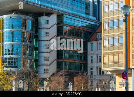 Modern big buildings in Potsdamer Platz, with an old one squeezed ...