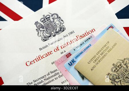 British emergency passport and Certificate of Naturalisation. Yellow ...