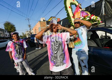 Non Exclusive: Devotees attend the altar of Santa Muerte located on ...