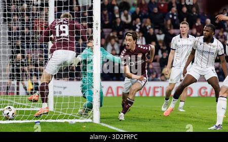 Heart of Midlothian's Tomas Bent Magnusson (left) and Dundee's Tony ...
