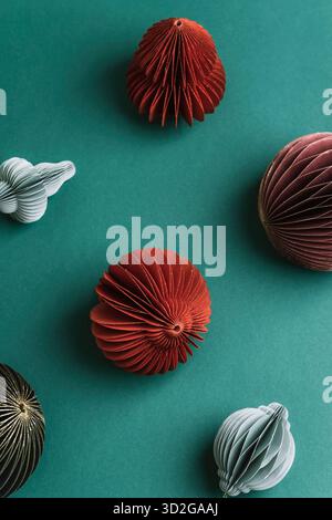 Christmas ornaments on bright paper background. Top view. Close up ...