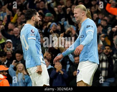 Manchester City's Rayan Cherki and Manchester City's Erling Haaland ...
