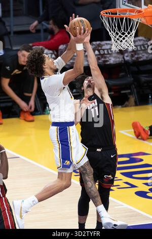 Miami Heat's Jaime Jaquez Jr., left, shoots the ball against ...