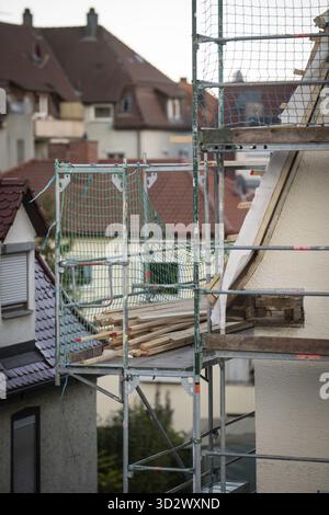 Construction scaffolding on residential building facade during ...