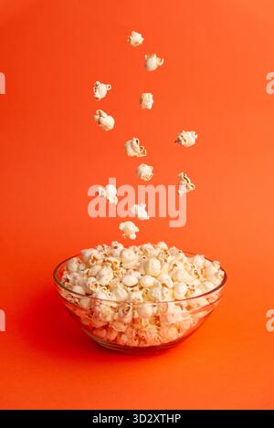 A bowl of delicious popcorn on a light background, natural delicious ...