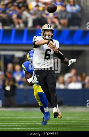 New Orleans Saints quarterback Tyler Shough (6) throws next to ...