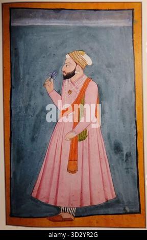 Painting of Guru Har Rai holding a flower, Pahari style, painted by a ...