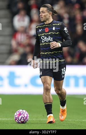 Jack Grealish of Everton breaks with the ball under pressure from ...