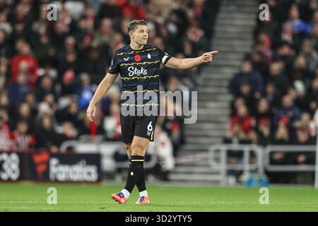 James Tarkowski of Everton gives his team instructions during the ...