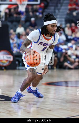 Florida guard Boogie Fland (0) dribbles during the second half of an ...