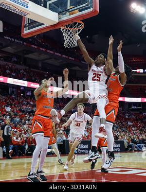 November 25, 2025: Campbell Fighting Camels guard D.J. Smith (9) drives ...