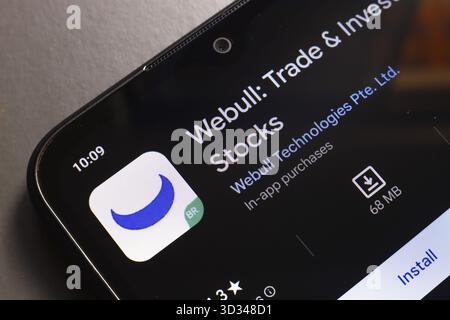 In this photo illustration, a Webull logo is seen displayed on a ...