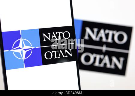 In this photo illustration, a NATO (North Atlantic Treaty Organization ...