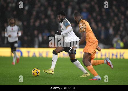 Derby County's Patrick Agyemang (centre) celebrates with team mates ...
