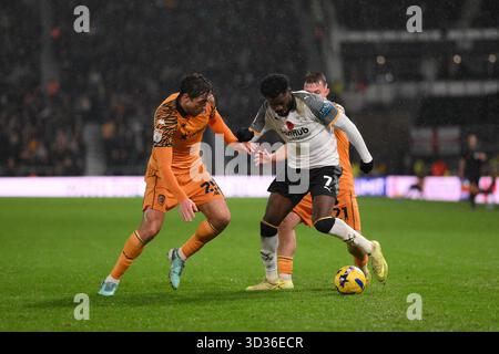 Derby County's Patrick Agyemang (centre) celebrates with team mates ...