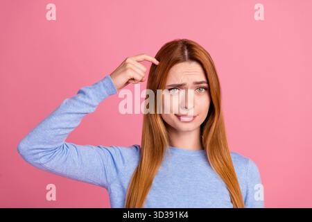 puzzled redhead stylish girl on color background. stylish girl isolated ...