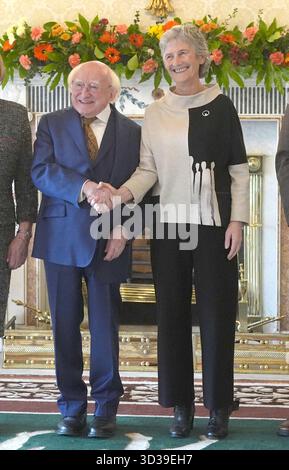 President Catherine Connolly and her husband Brian McEnery speak to ...